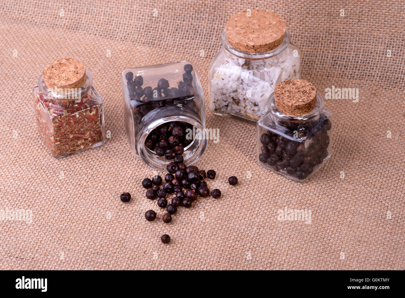 photo showing juniper in glass containers Stock Photo - Alamy