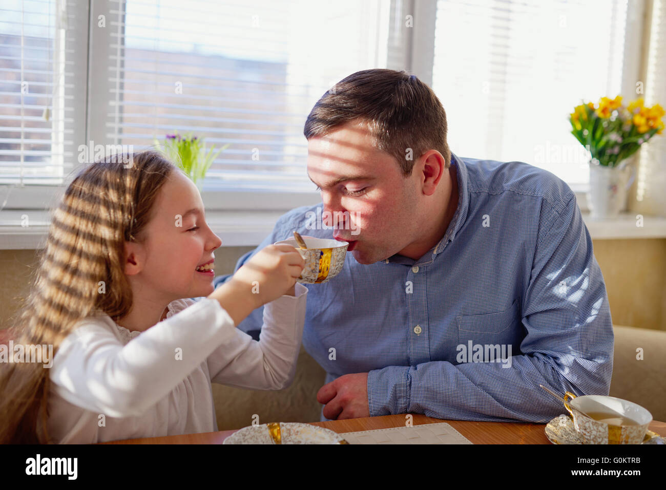 family has breakfast in the morning Stock Photo - Alamy