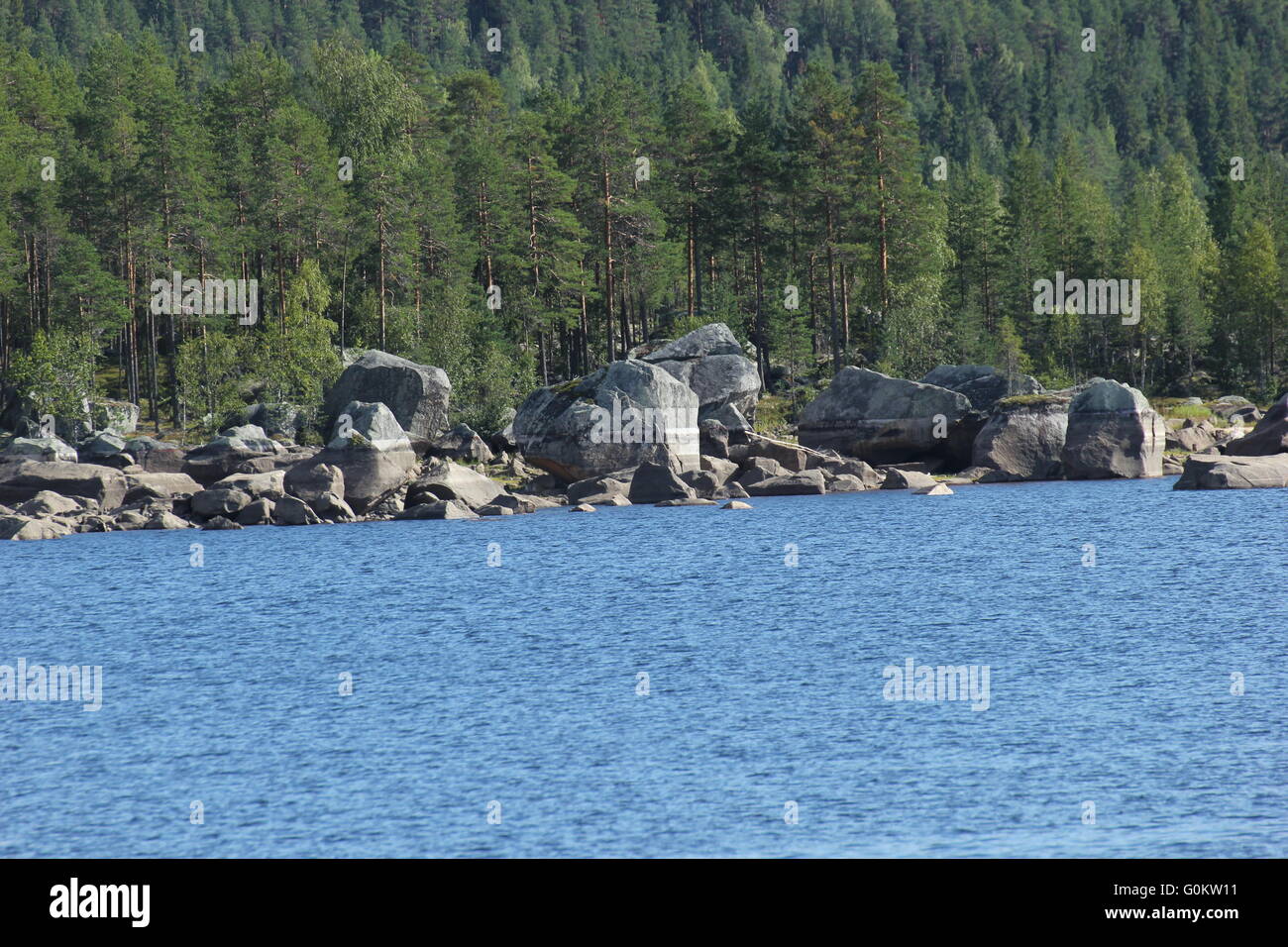 Big rocks at the edge Höljessjön in Värmland, Sweden, near the ...