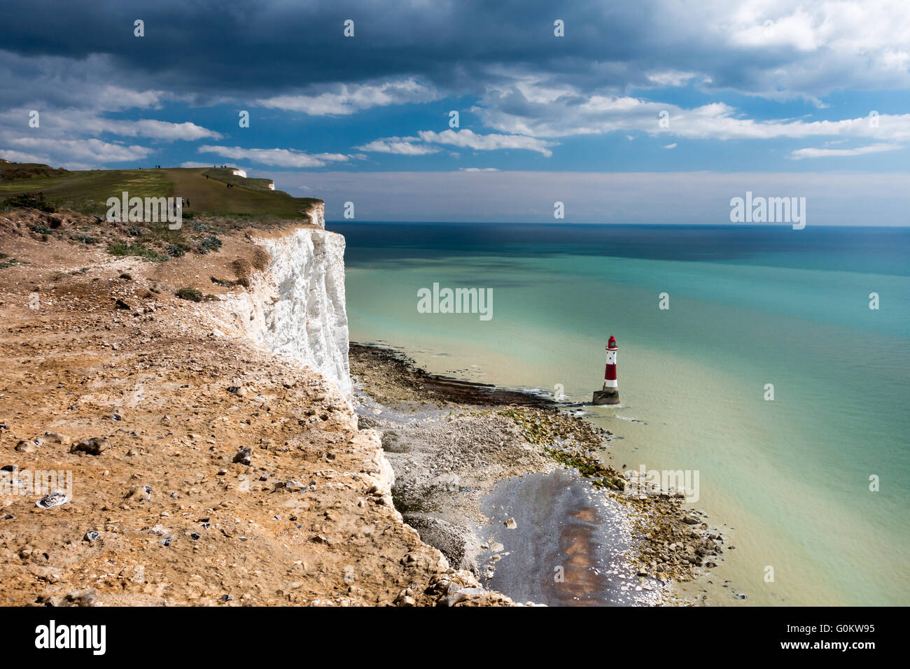 The dramatic 530 feet high cliffs of Beachy Head, and lighthouse Stock ...