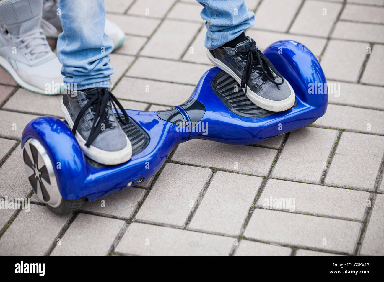 Boy riding segway hi-res stock photography and images - Alamy