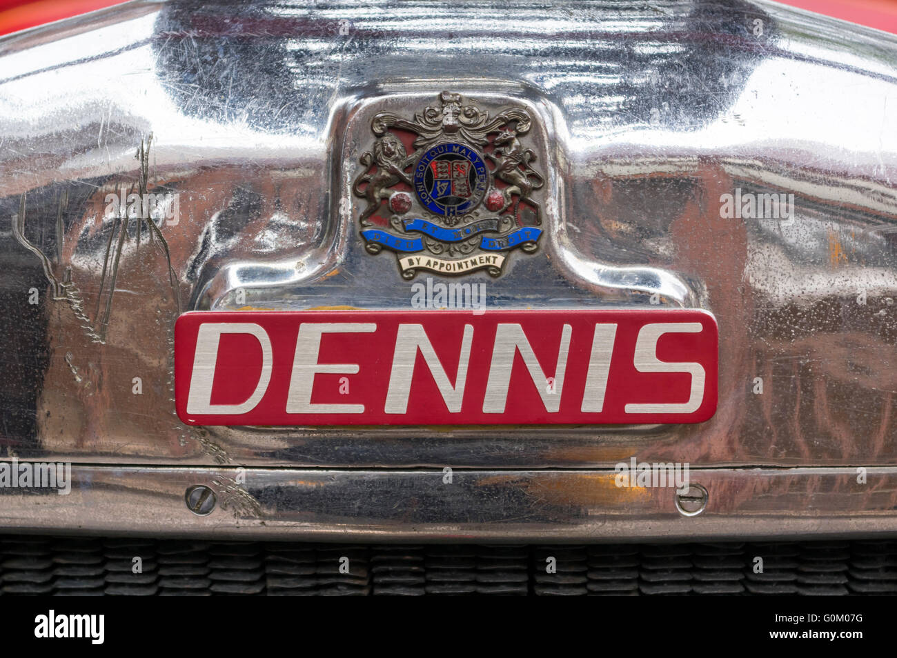 Badge of a 1940ies Dennis fire engine Stock Photo - Alamy