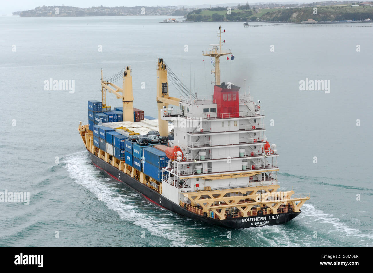 Container ship Southern Lily heads out of Auckland Harbour with ...