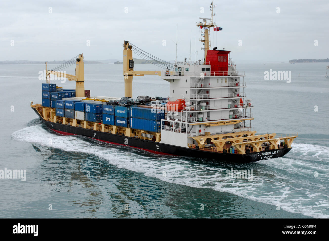 Container ship Southern Lily heads out of Auckland Harbour with ...