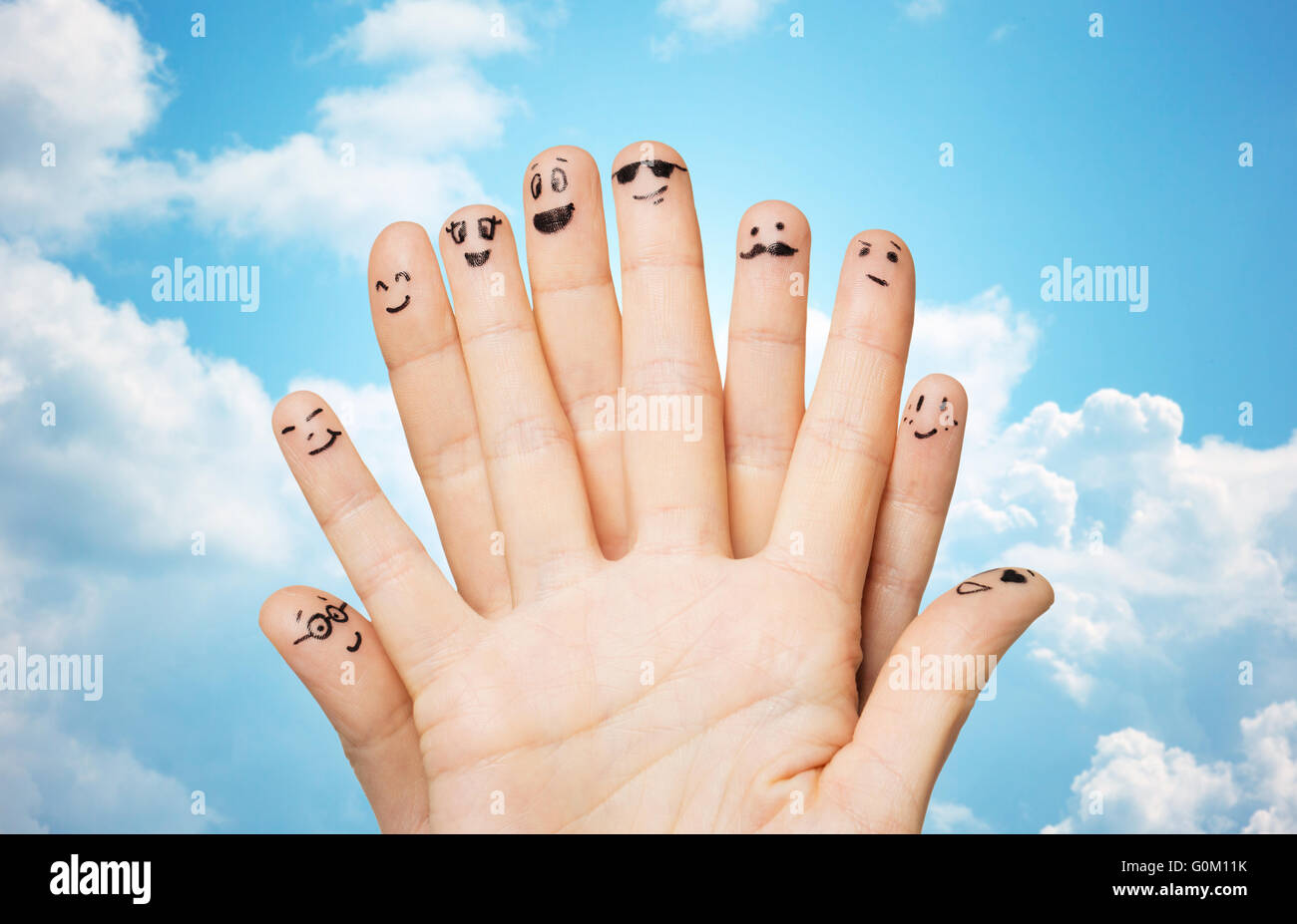 close up of hands and fingers with smiley faces Stock Photo - Alamy