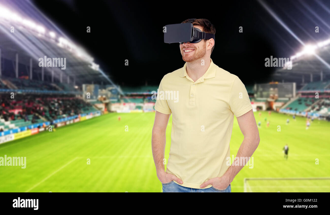 man in virtual reality headset over football field Stock Photo - Alamy