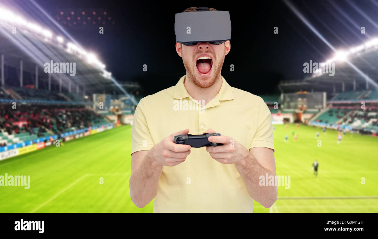 man in virtual reality headset over football field Stock Photo - Alamy