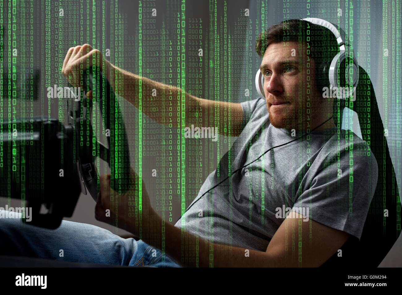 man playing car racing video game at home Stock Photo - Alamy