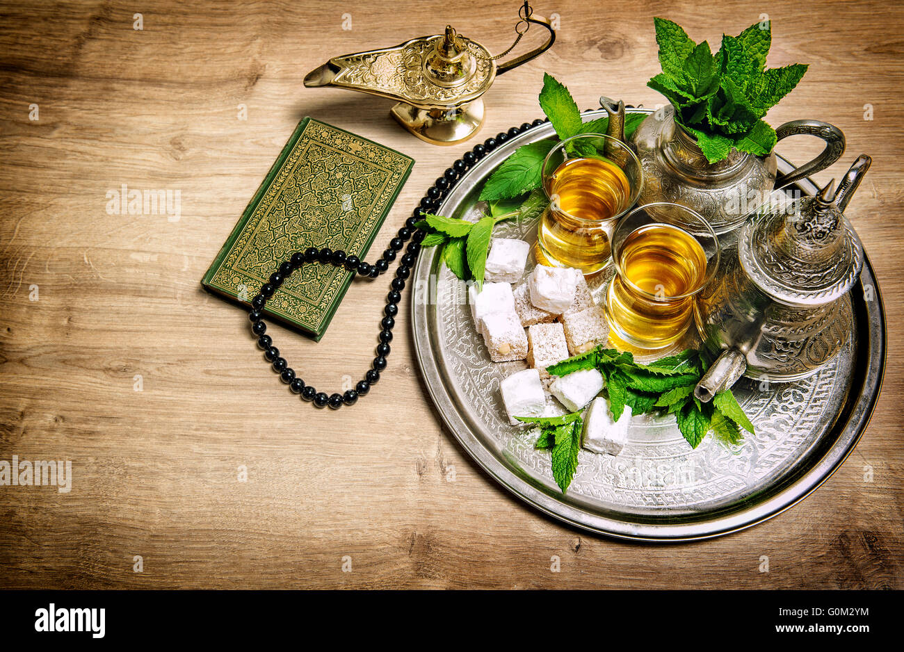 Tea pot with glasses. Oriental hospitality concept. Food and drink ...