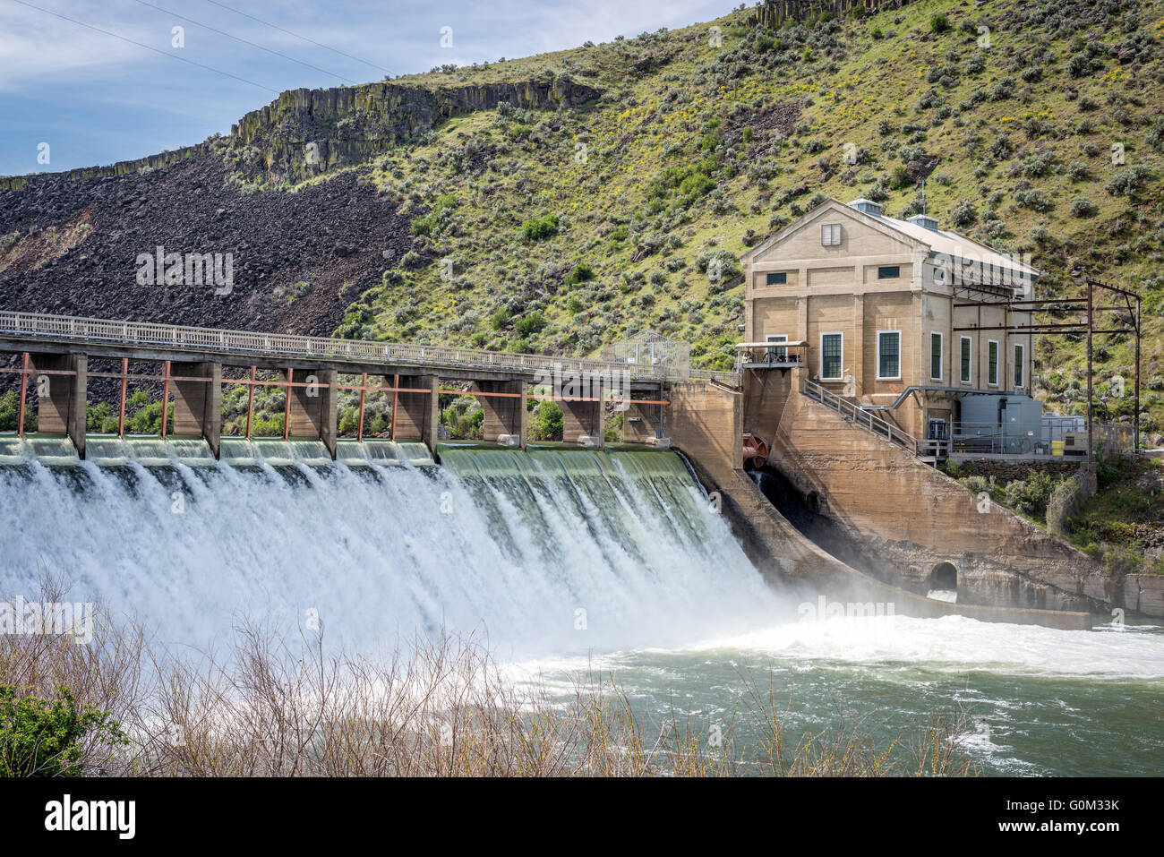 Spring water flow on an Idaho river dam Stock Photo - Alamy