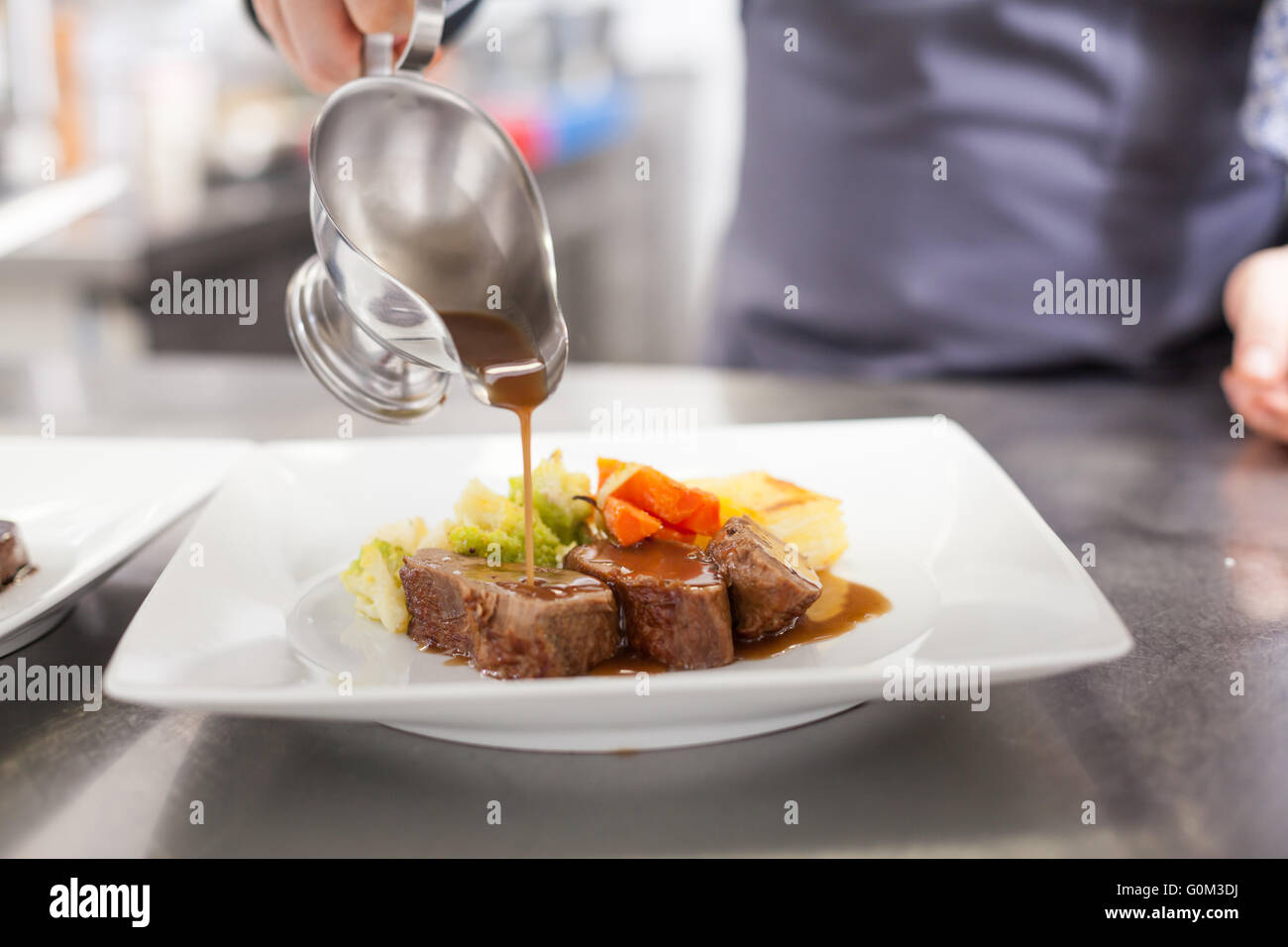 Plating up hi-res stock photography and images - Alamy