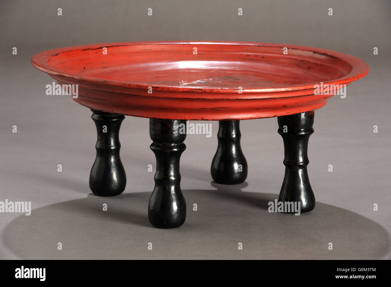 Burmese table of wood Stock Photo - Alamy