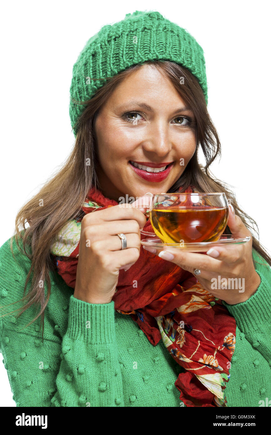 Attractive woman warming up with a cup of hot tea Stock Photo - Alamy