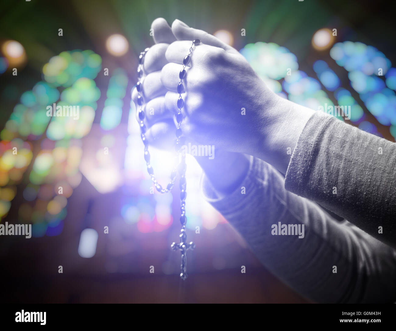 closeup image of hands and rosary Stock Photo - Alamy