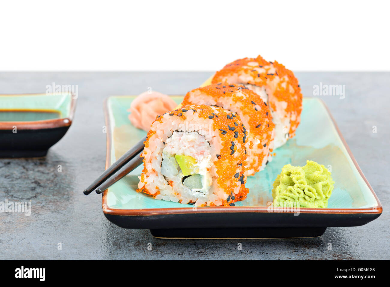 California maki sushi with masago on the plate. Roll made of crab meat ...