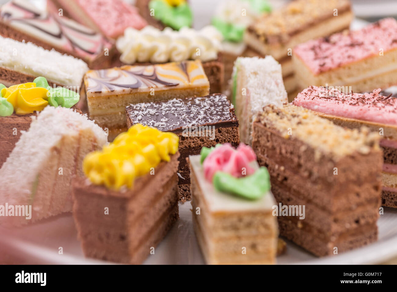 Different sort of small home made sweet cakes Stock Photo - Alamy