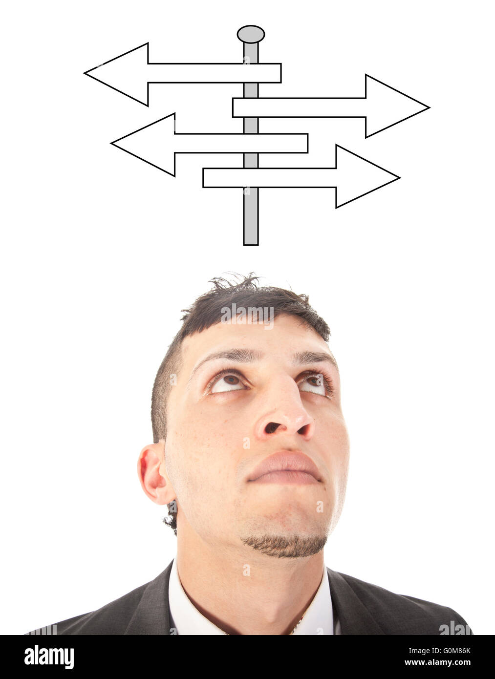 Young man making a choice with arrows isolated on white background ...