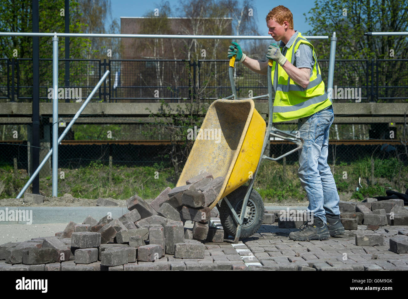 A wheelbarrow with bricks hi-res stock photography and images - Alamy