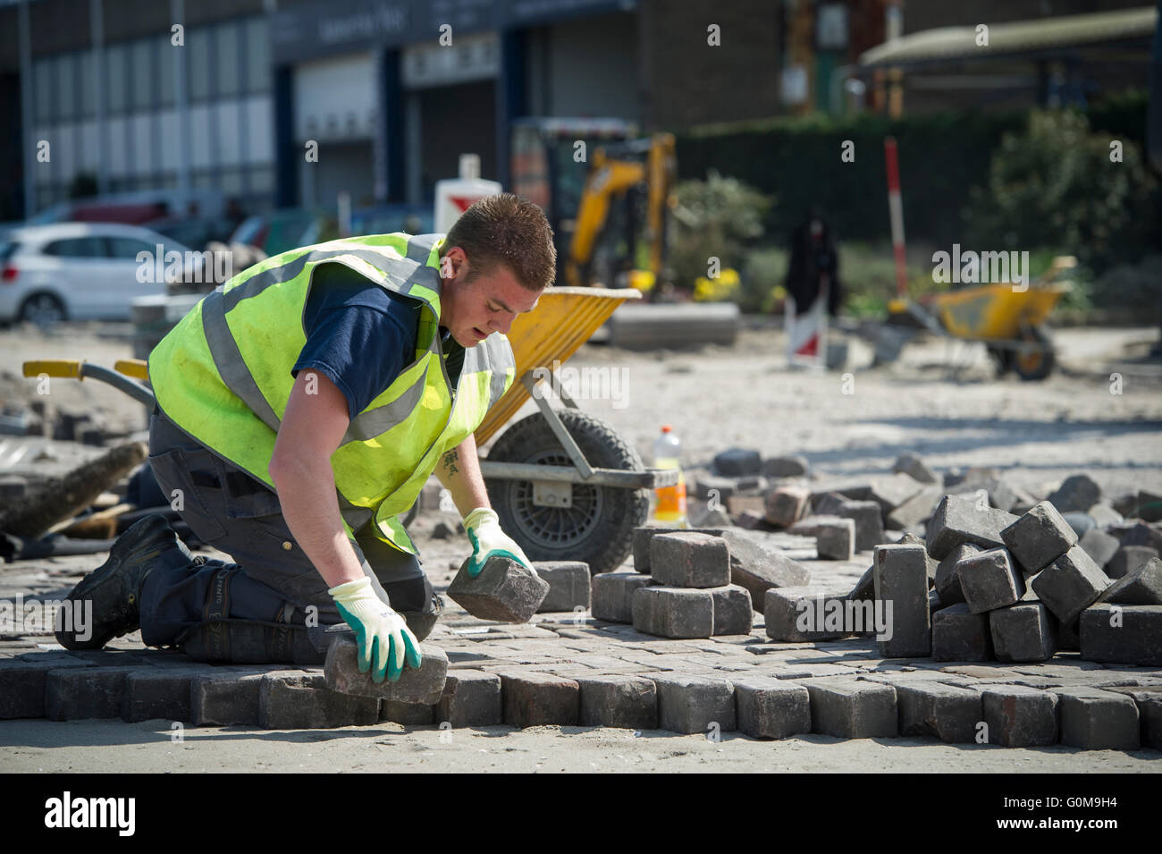 A wheelbarrow with bricks hi-res stock photography and images - Alamy