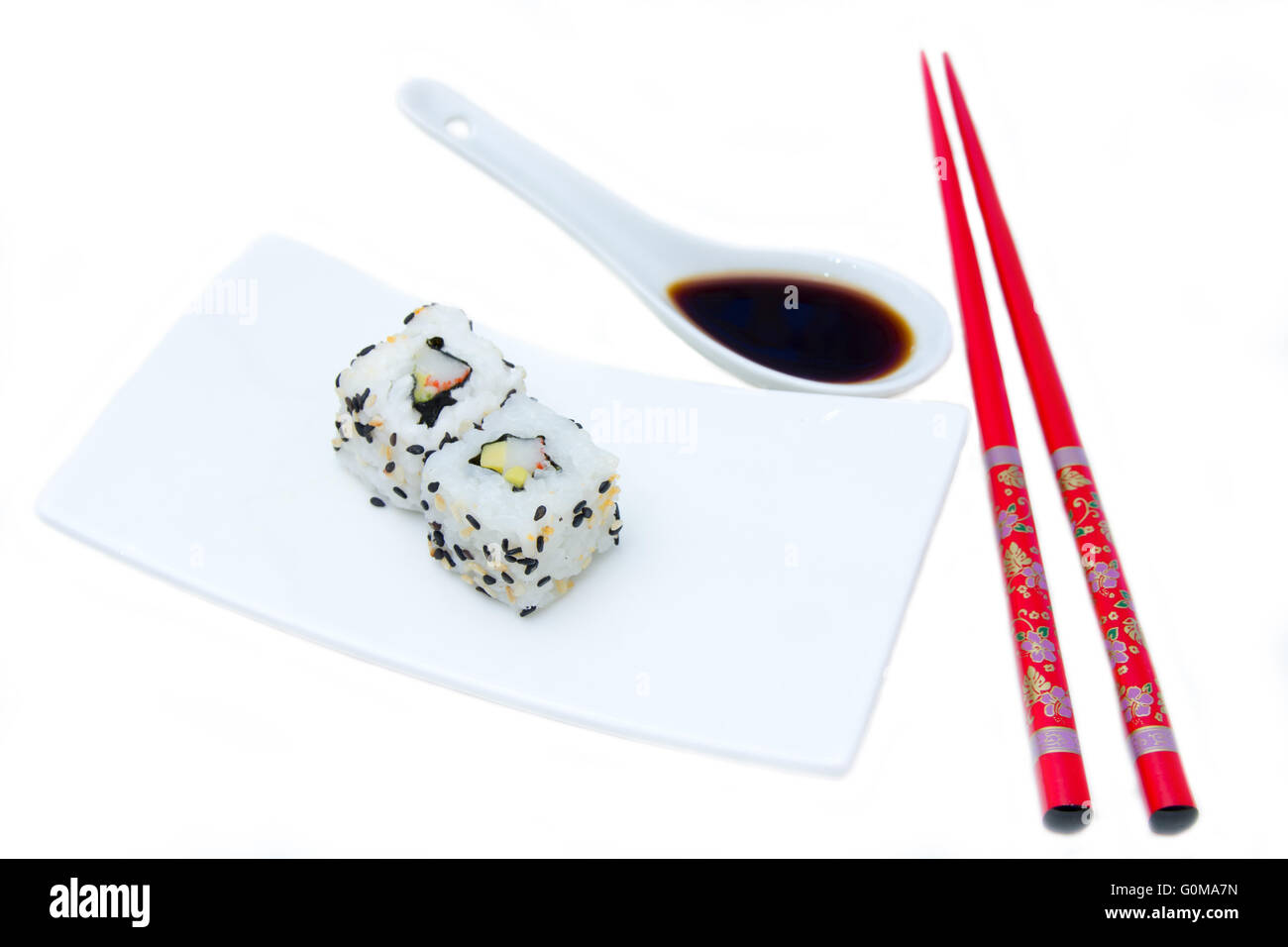 California roll with avocado and surimi on a white background Stock ...