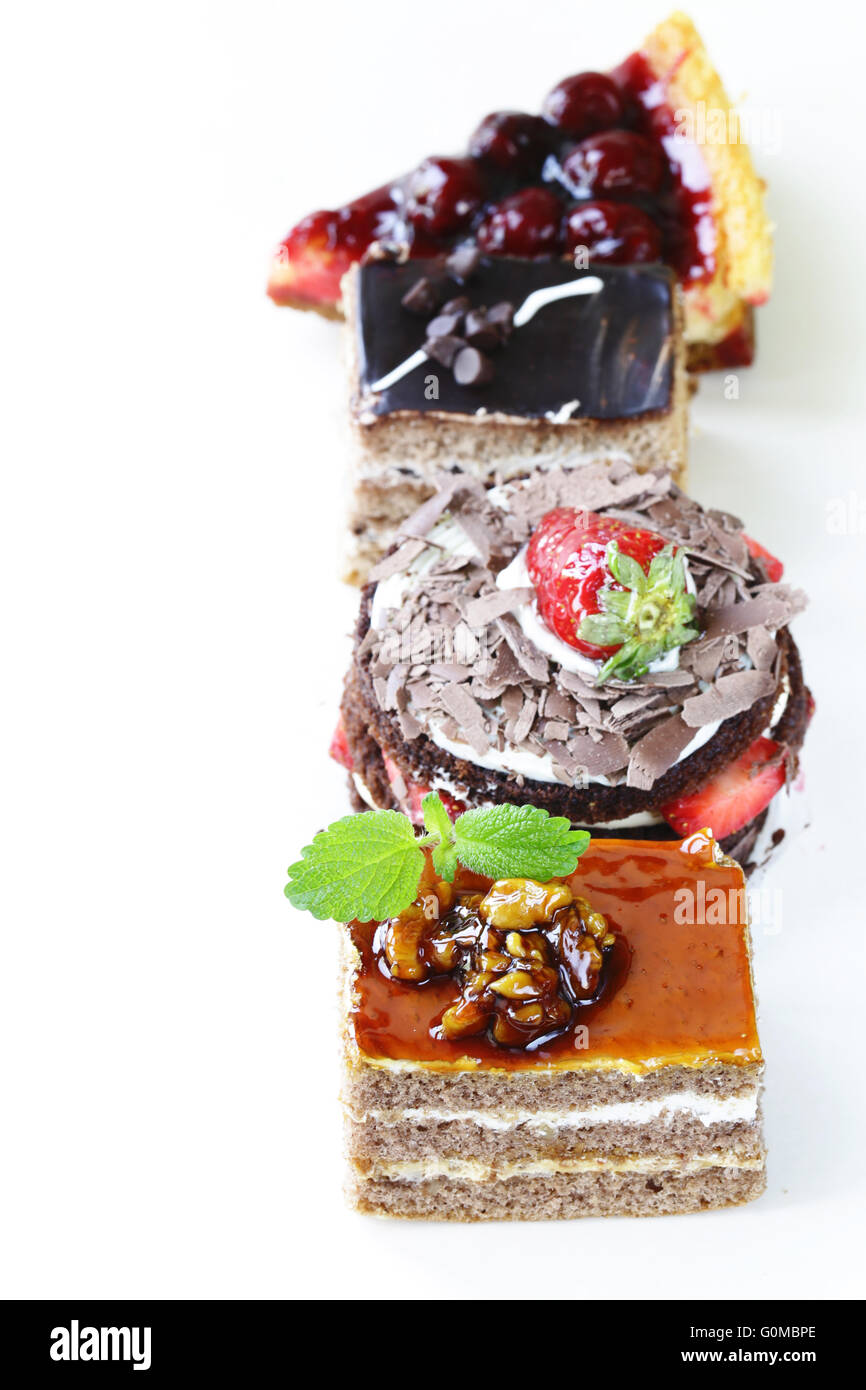Assorted desserts, cakes and pastries on a white background Stock Photo ...