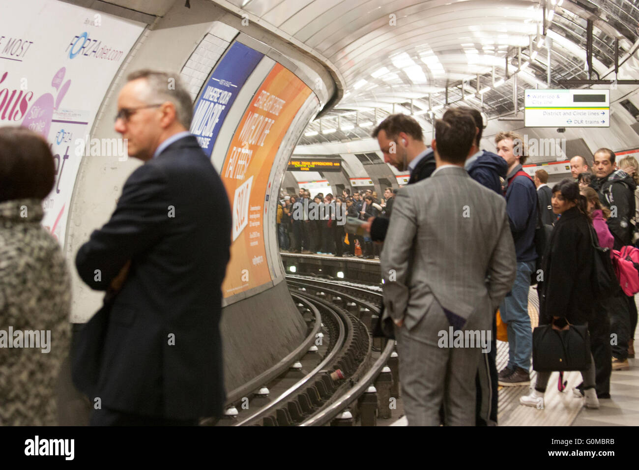 Crowded platform at tube station on London underground tube network ...