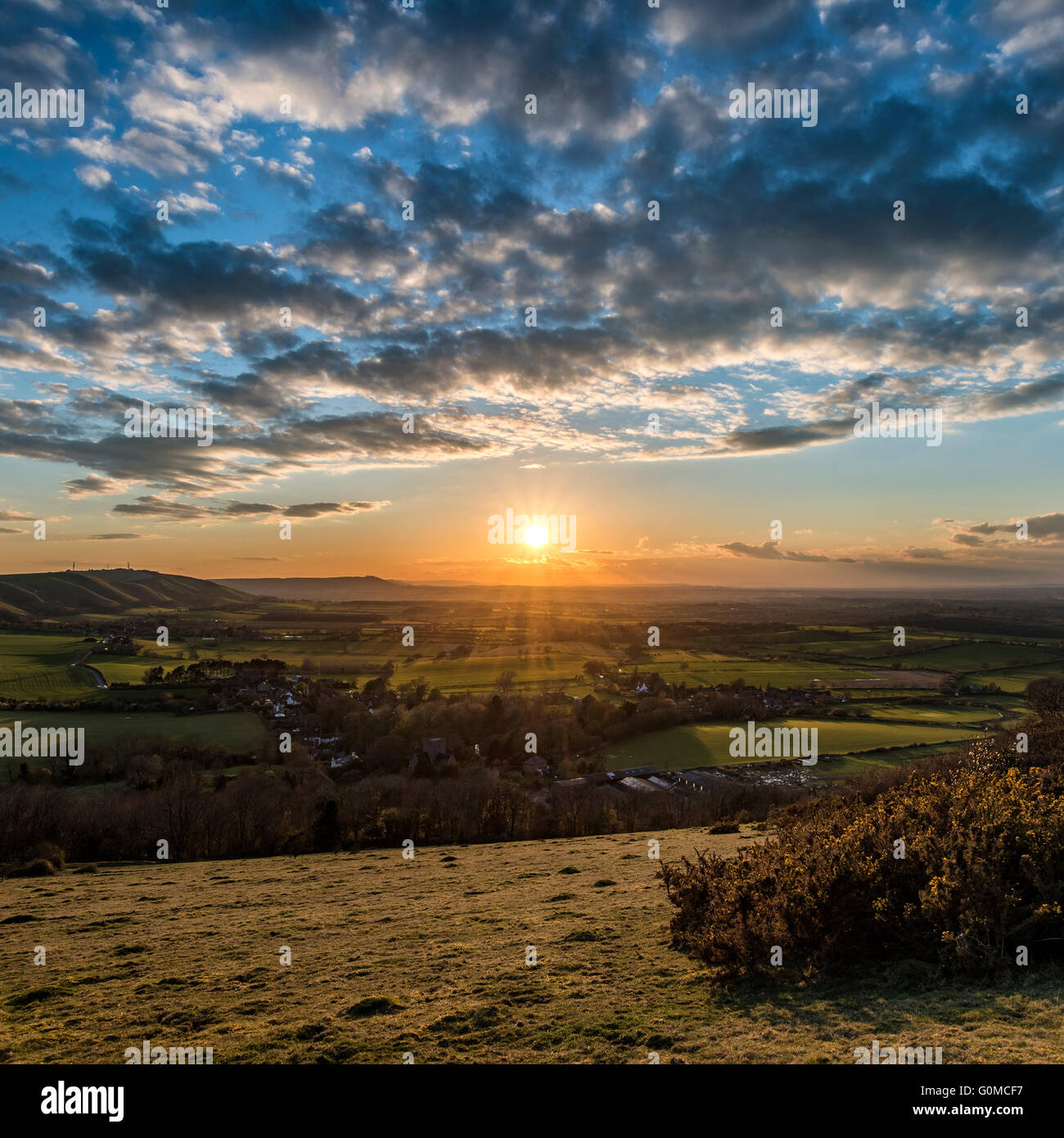Stunning landscape image of sunset over countryside landscape in ...