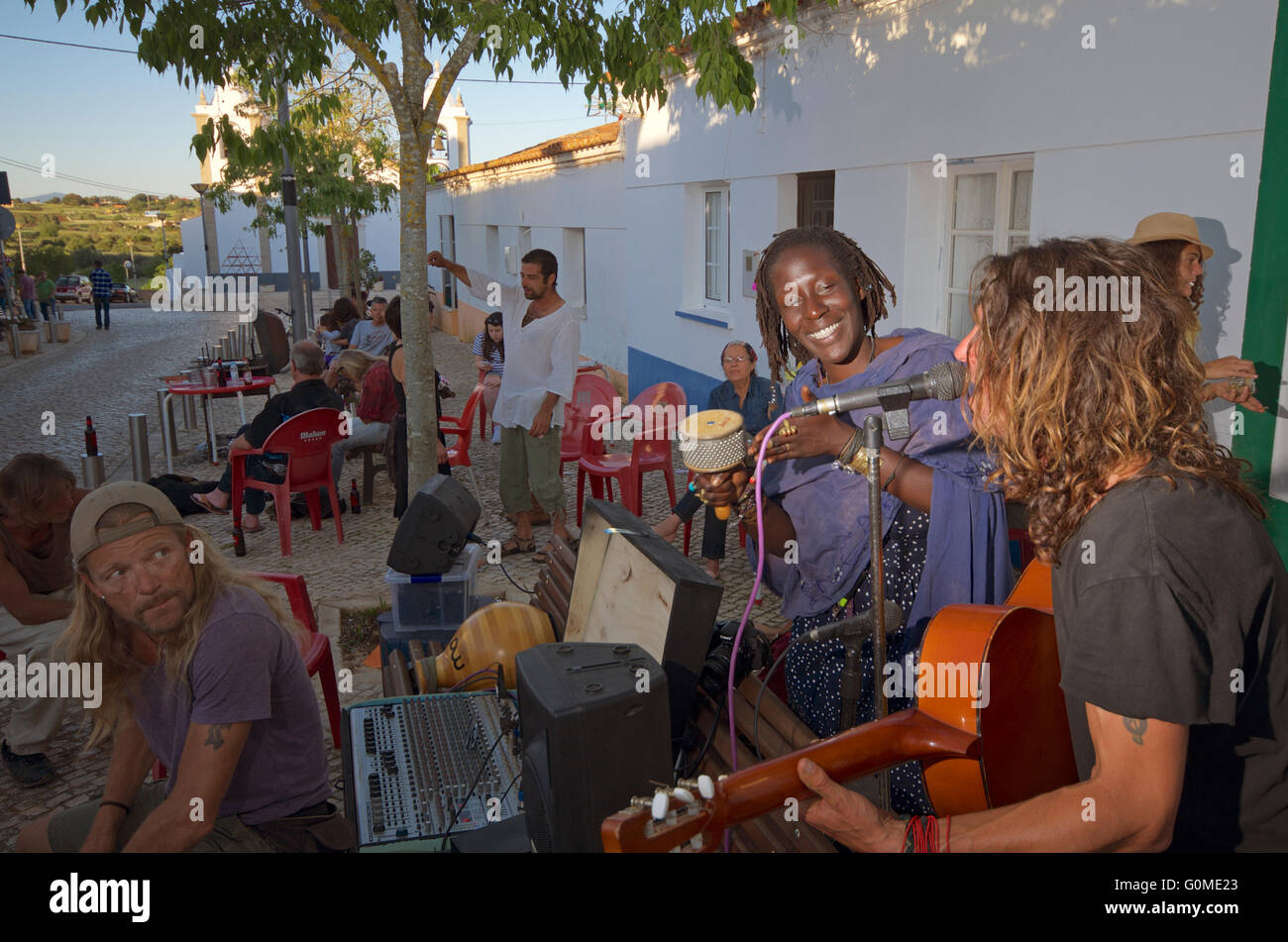 Musicians playing at a street party, Barao de Sao Joao, Algarve ...