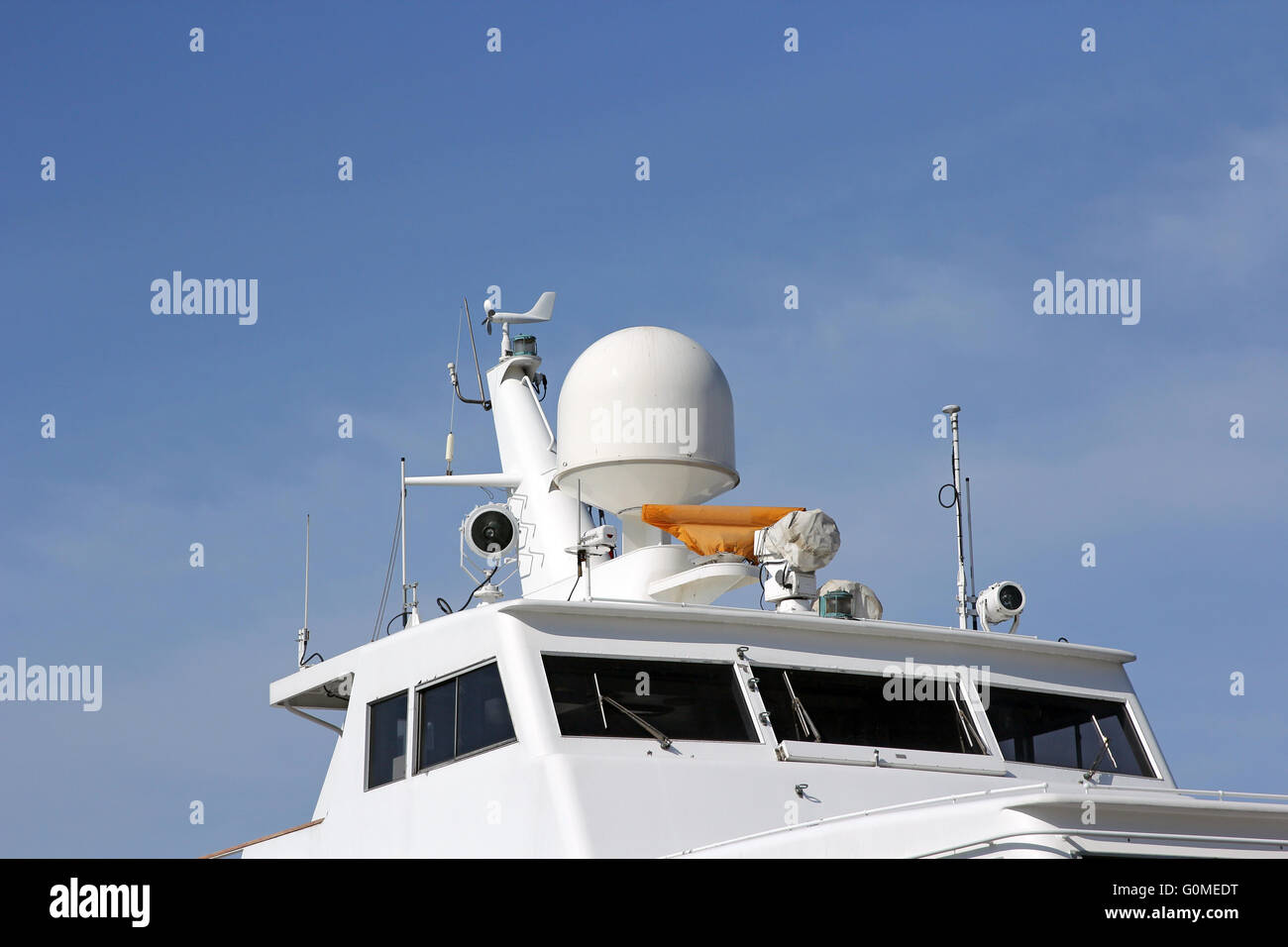 Ships antenna and navigation system in a clear blue sky Stock Photo - Alamy
