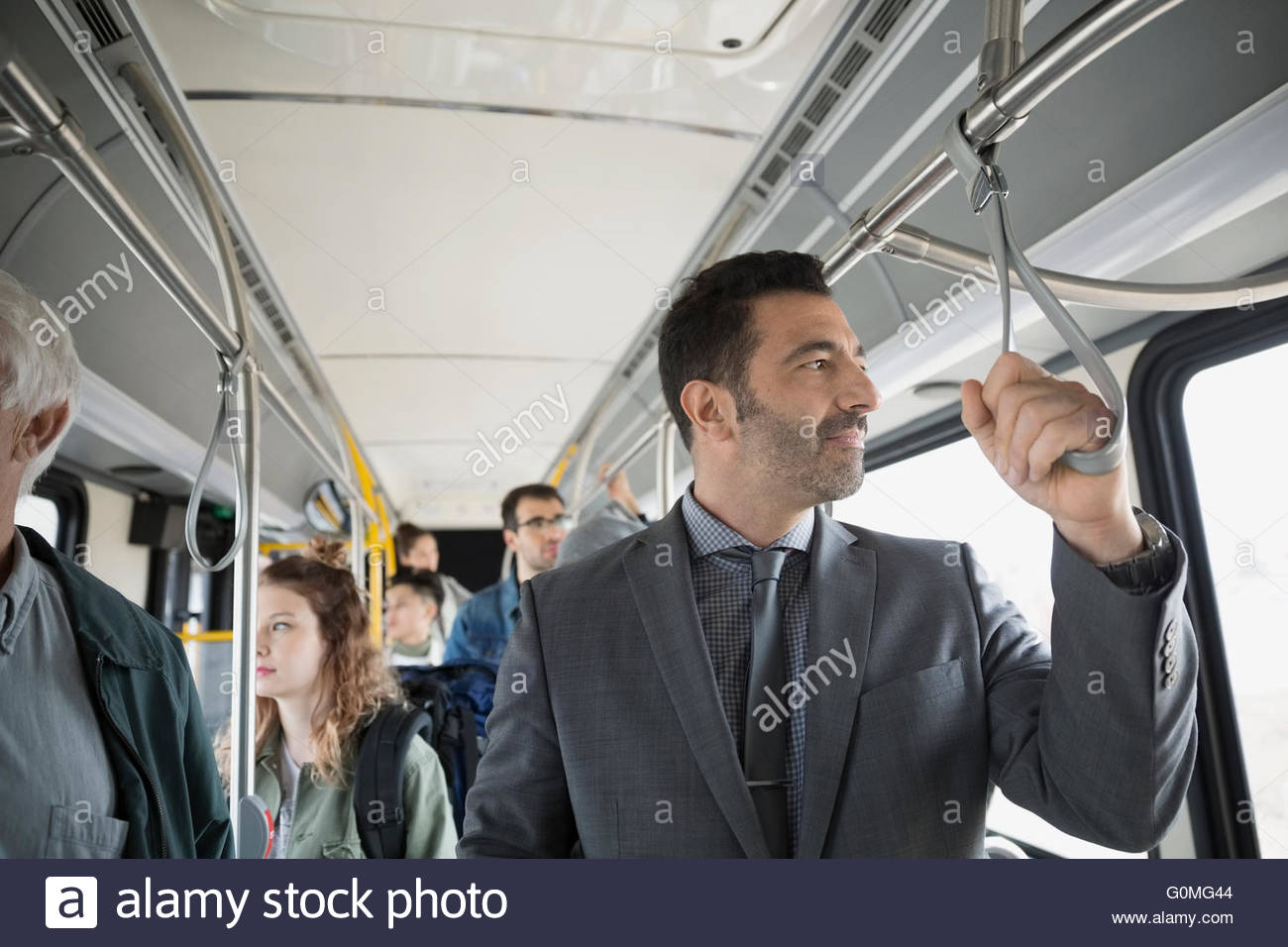 Man Standing Riding Bus High Resolution Stock Photography and Images ...