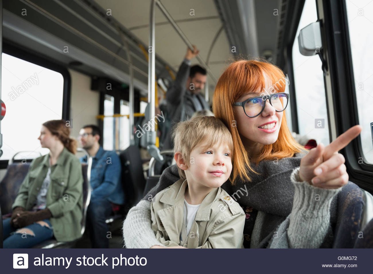 Boy looking out bus window hi-res stock photography and images - Alamy