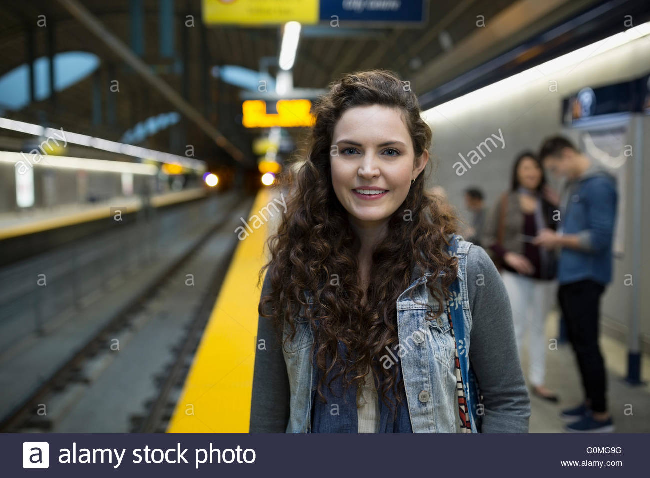 Woman at subway hi-res stock photography and images - Alamy