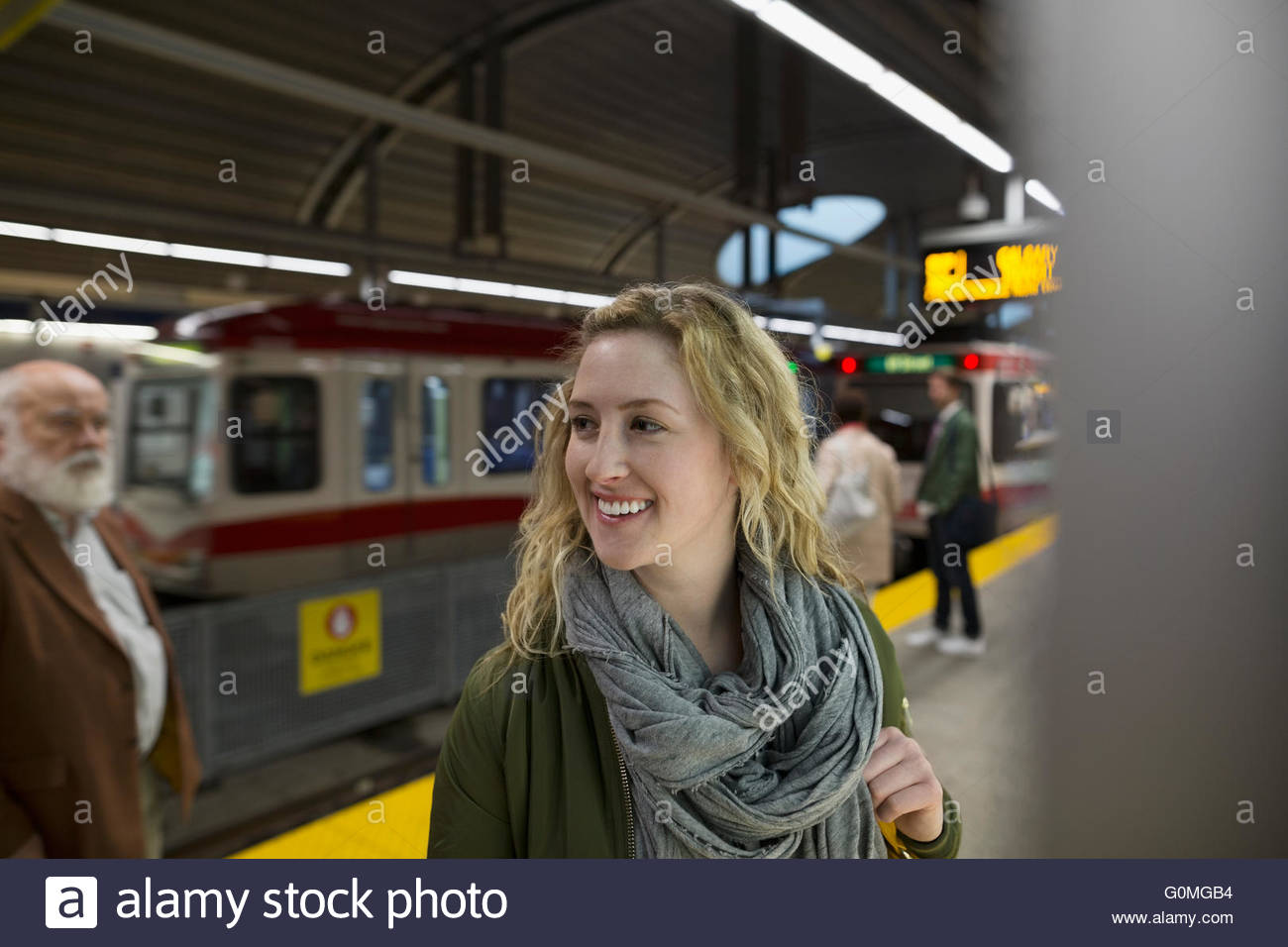 Woman on subway train hi-res stock photography and images - Alamy