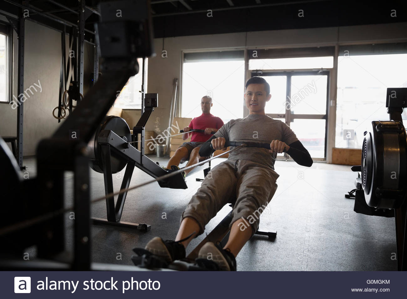 Man using rowing machine hi-res stock photography and images - Alamy