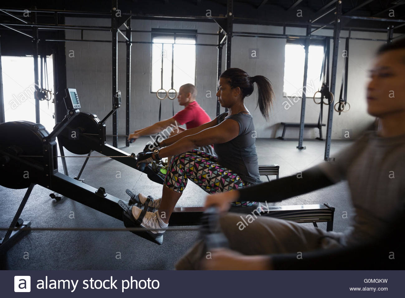 Woman gym rowing machine hi-res stock photography and images - Alamy