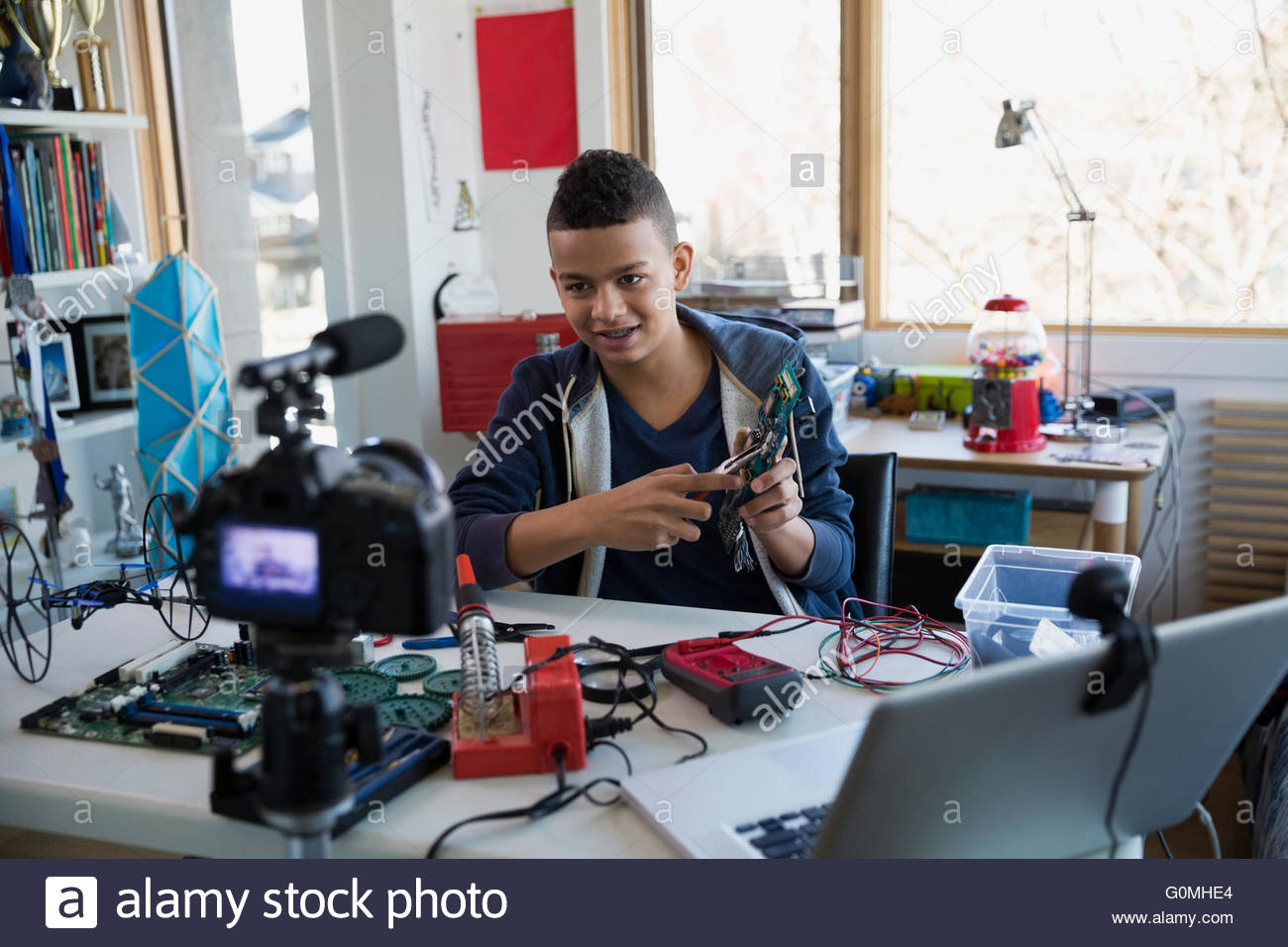 Boy disassembling hi-res stock photography and images - Alamy