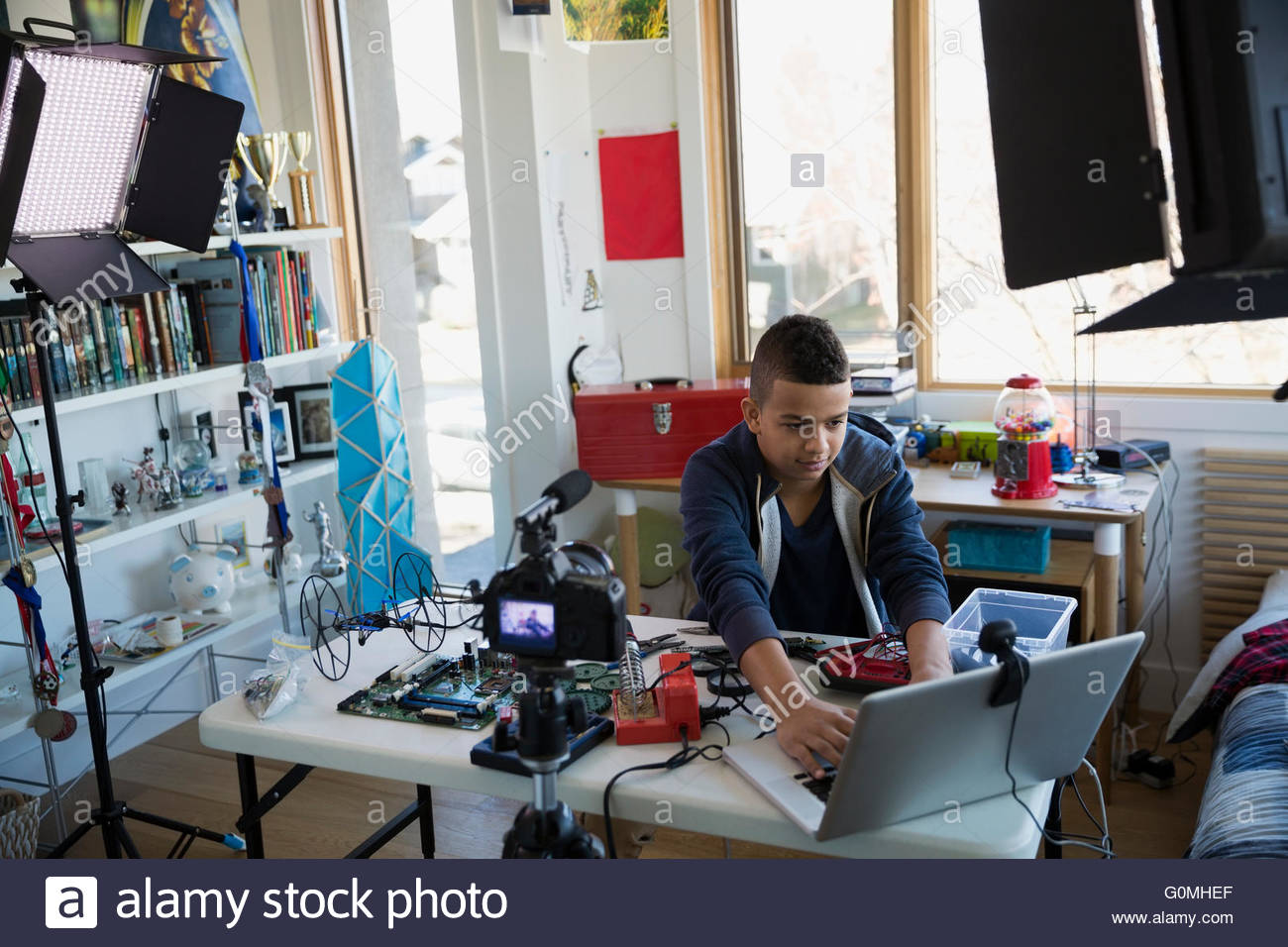 Boy disassembling hi-res stock photography and images - Alamy