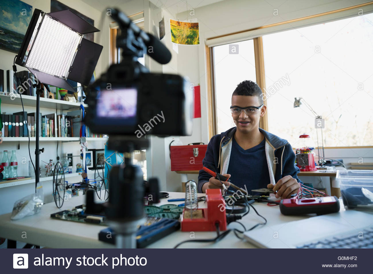 Boy disassembling hi-res stock photography and images - Alamy