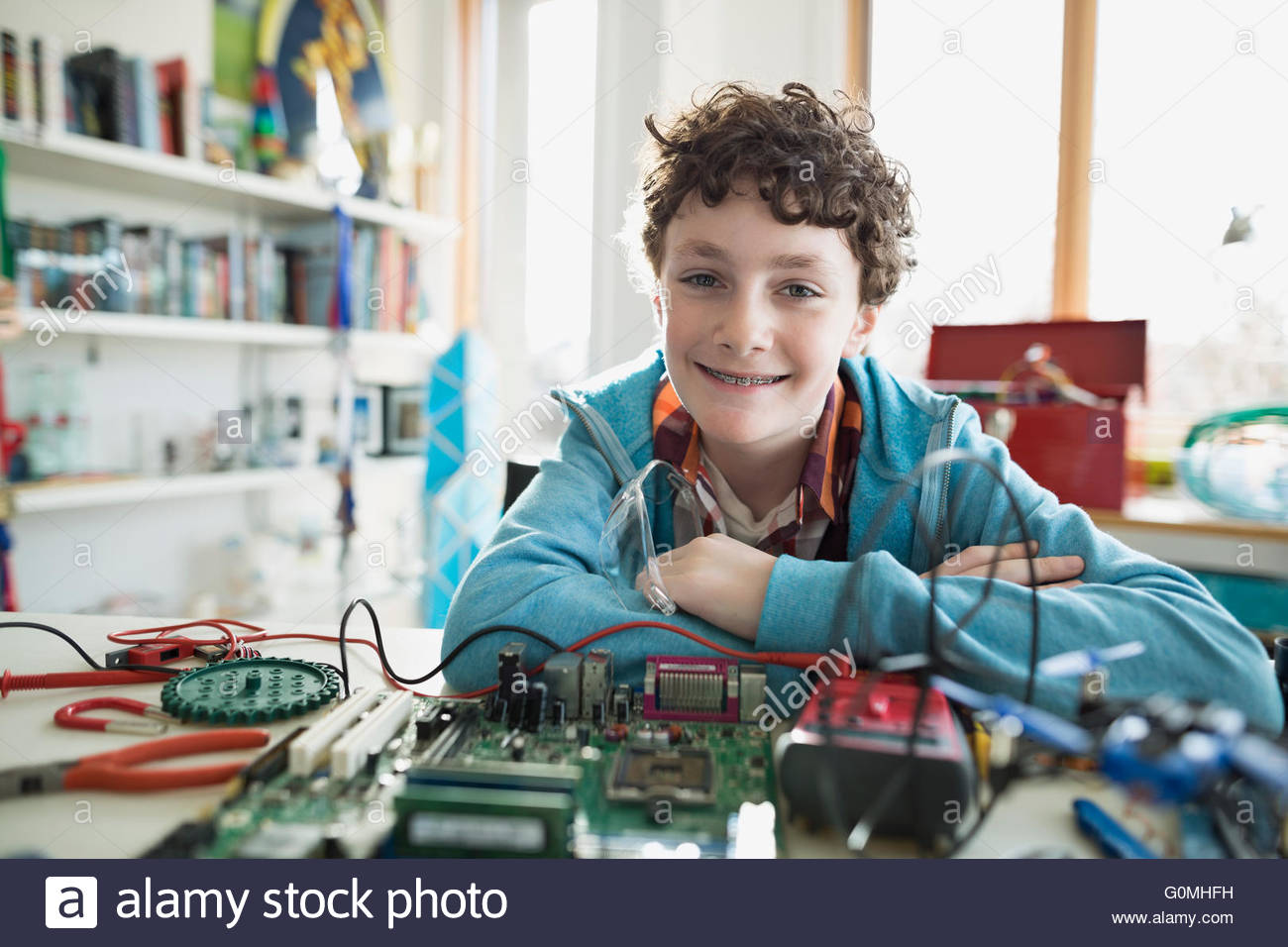 Boy disassembling hi-res stock photography and images - Alamy