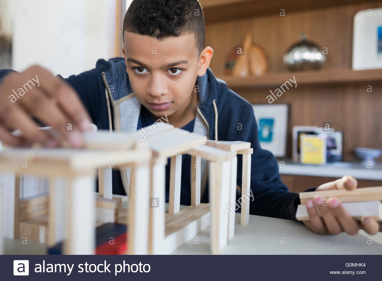 Boy building blocks hi-res stock photography and images - Alamy