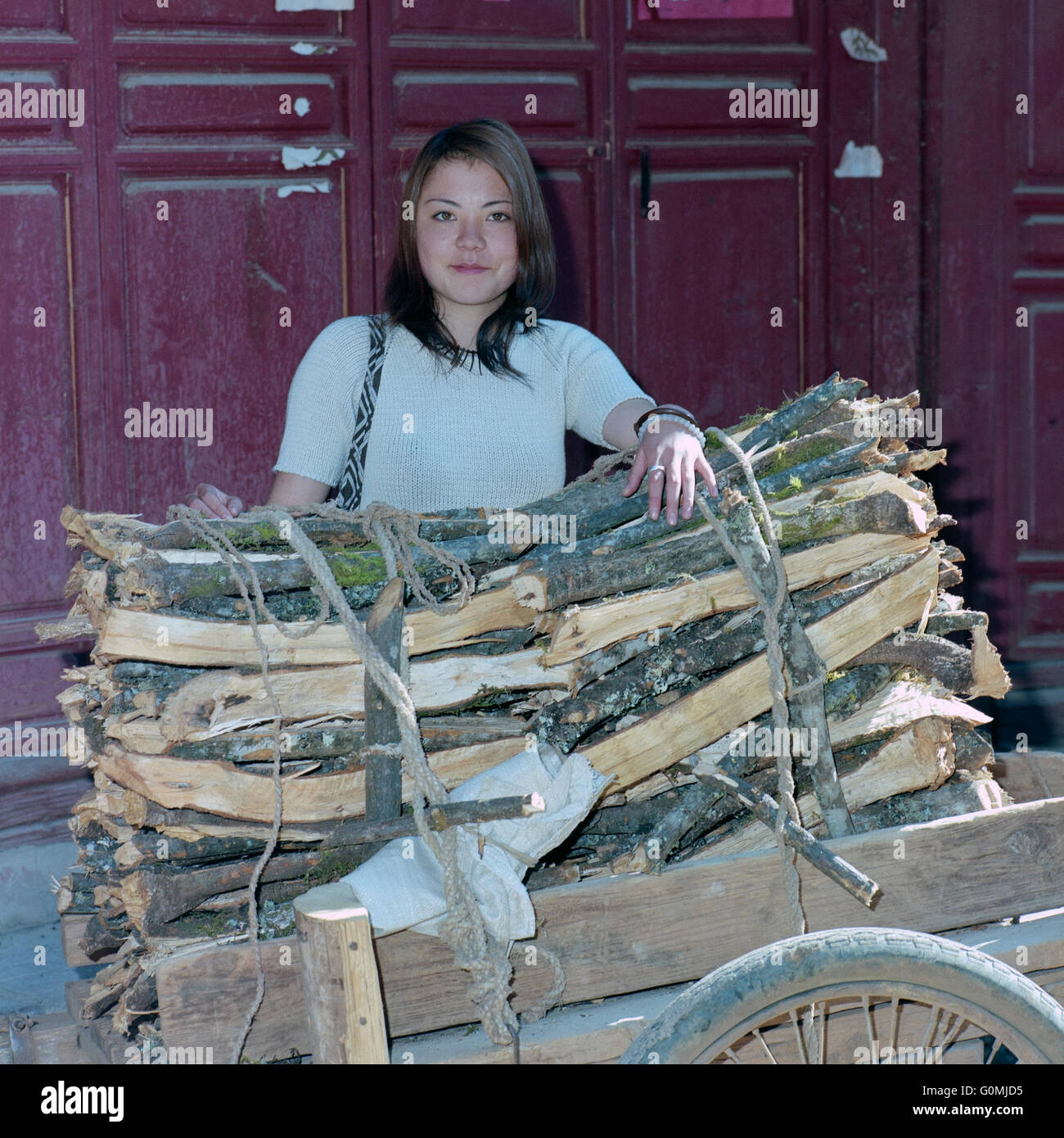 young pretty local tourist poses for picture in china Stock Photo - Alamy