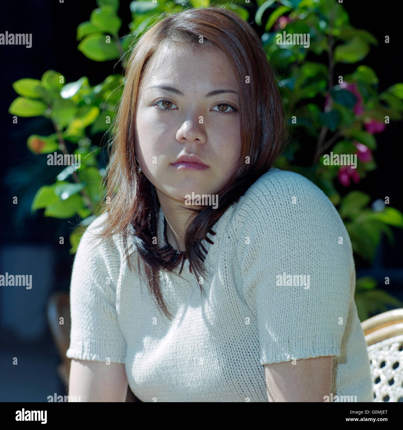 young pretty local tourist poses for picture in china Stock Photo - Alamy