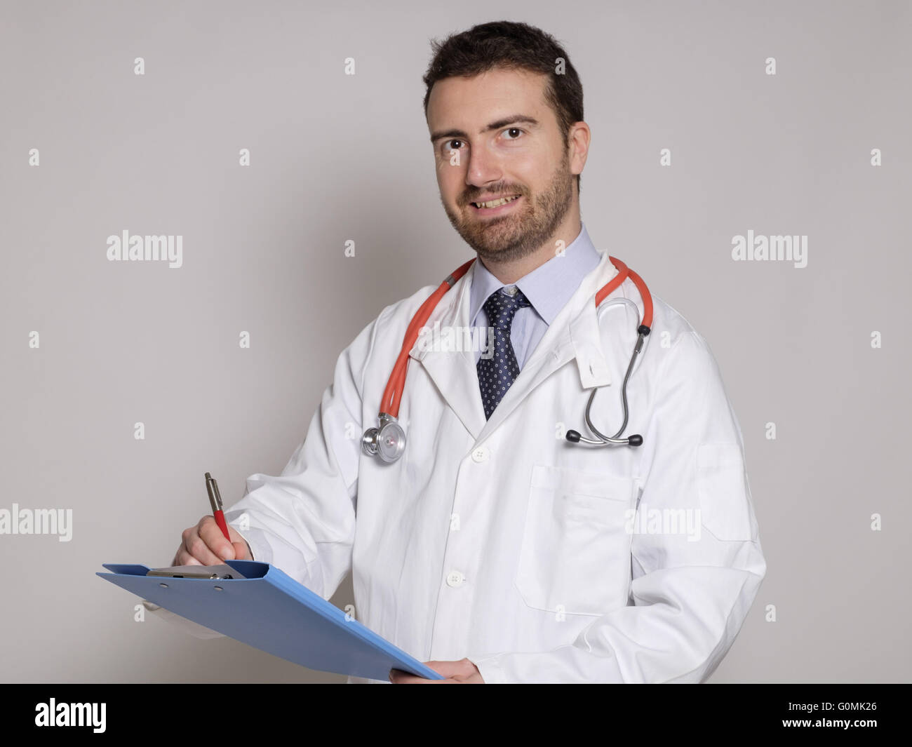 confidence doctor isolated on gray background Stock Photo - Alamy