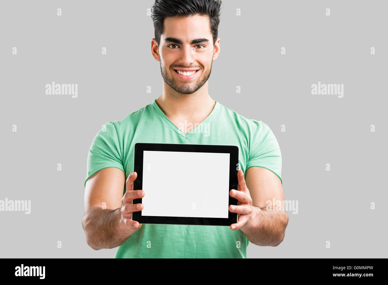 Handsome young man showing hi-res stock photography and images - Alamy