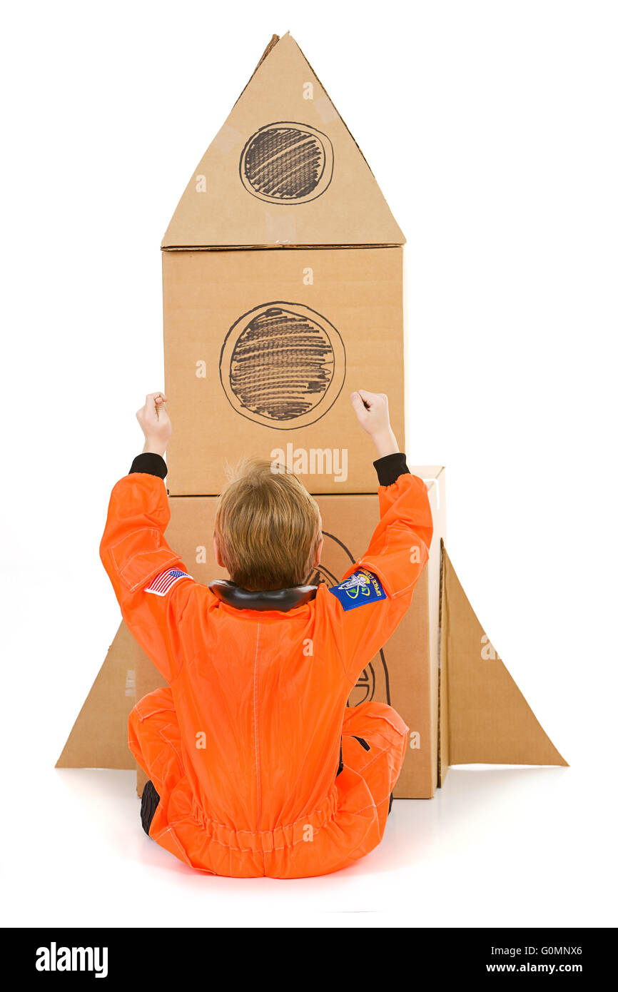 Boy building cardboard spaceship hi-res stock photography and images ...