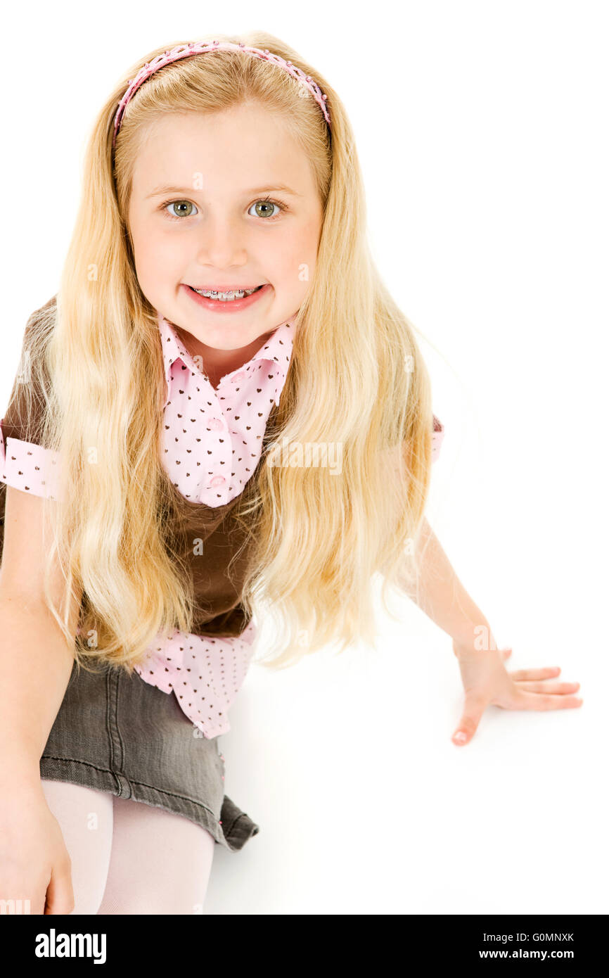 Girl sitting isolated hi-res stock photography and images - Alamy
