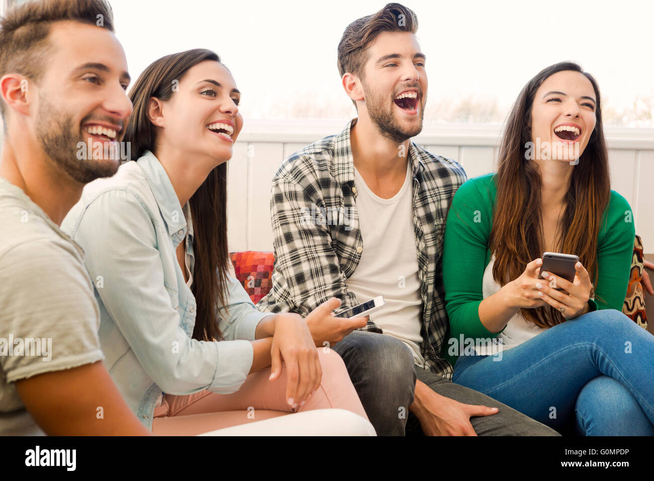 Friends meeting at the local coffee shop and having fun Stock Photo - Alamy