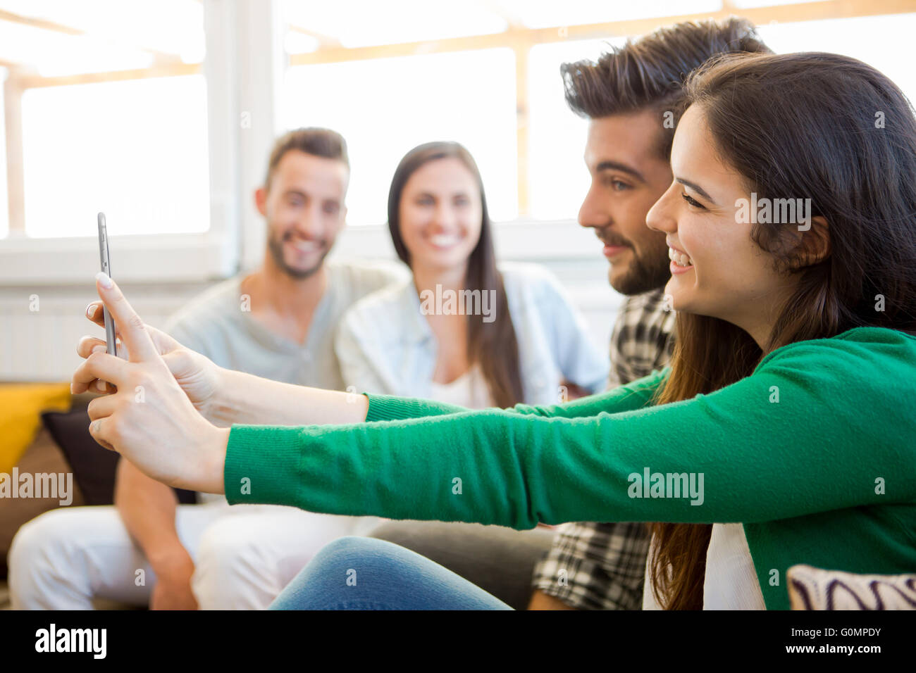 Friends meeting at the local coffee shop and having fun Stock Photo - Alamy