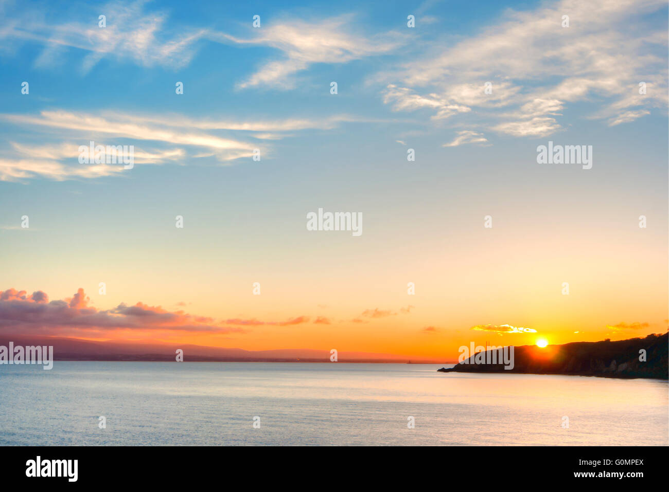 Beautiful sunset at the Howth Peninsula in Dublin, Ireland Stock Photo ...