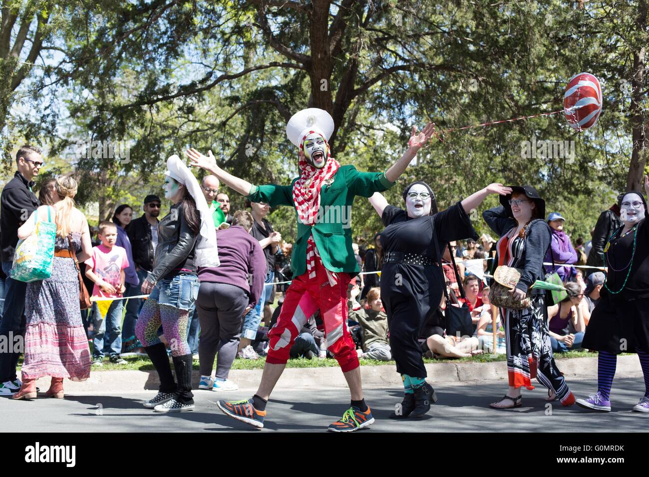 Marchers in costume at the May Day celebration including parade and ...